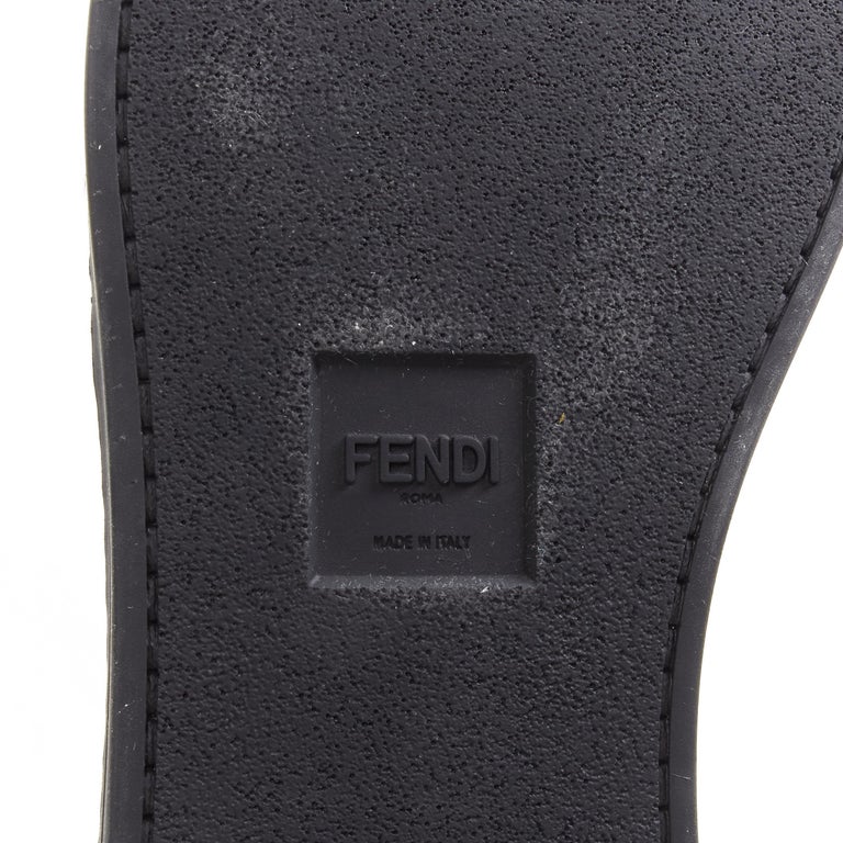 new FENDI Monster Bug Eye gold metal plate black low top sneaker UK9 EU43 For Sale at 1stDibs