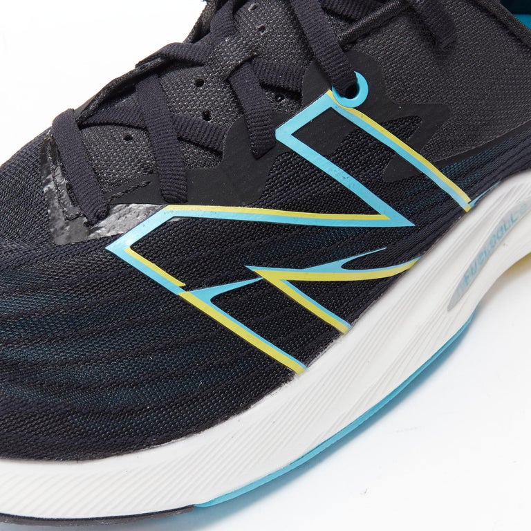 new NEW BALANCE MFCXLK2 Fuel Cell Rebel V2 black blue running sneaker ...