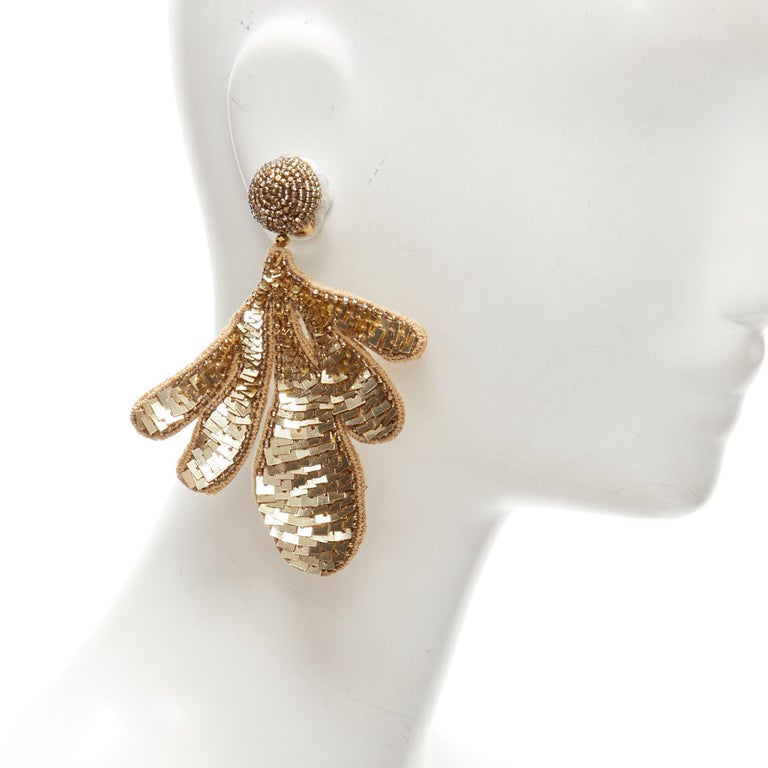 new OSCAR DE LA RENTA gold sequin bead embellished leaf clip on earring For Sale at 1stDibs