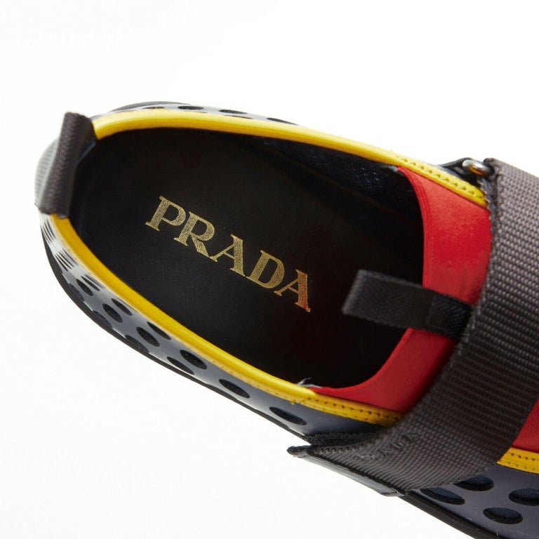 new PRADA navy holey cut out rubber magic tape strap low casual sneaker UK7.5 For Sale at 1stDibs
