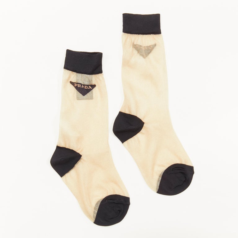 new PRADA Triangle logo beige semi sheer black trimmed fine cotton knit ...