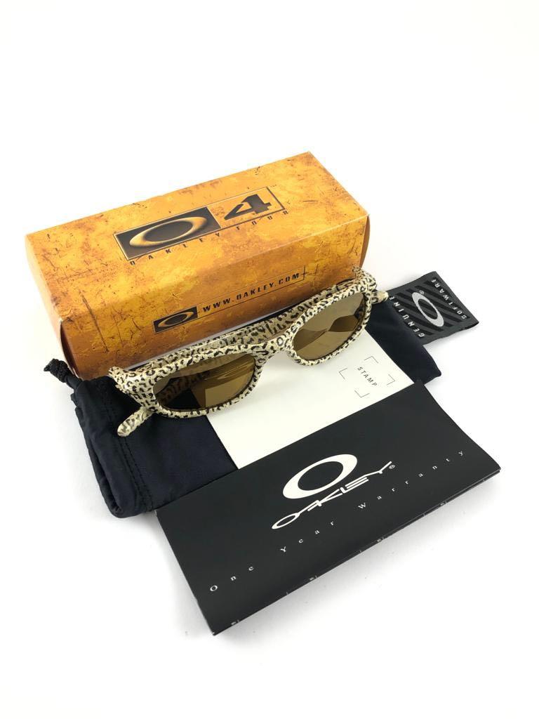 New Vintage Oakley Four Cheetah Gold Iridium 2000 Sunglasses at 1stDibs