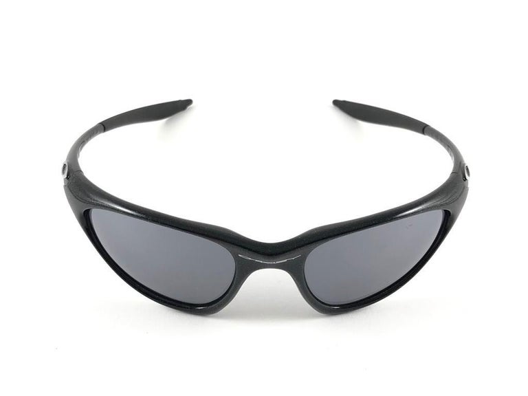 New Vintage Oakley Topcoat Metallic Black Iridium Lens 1999 Sunglasses For Sale At 1stdibs