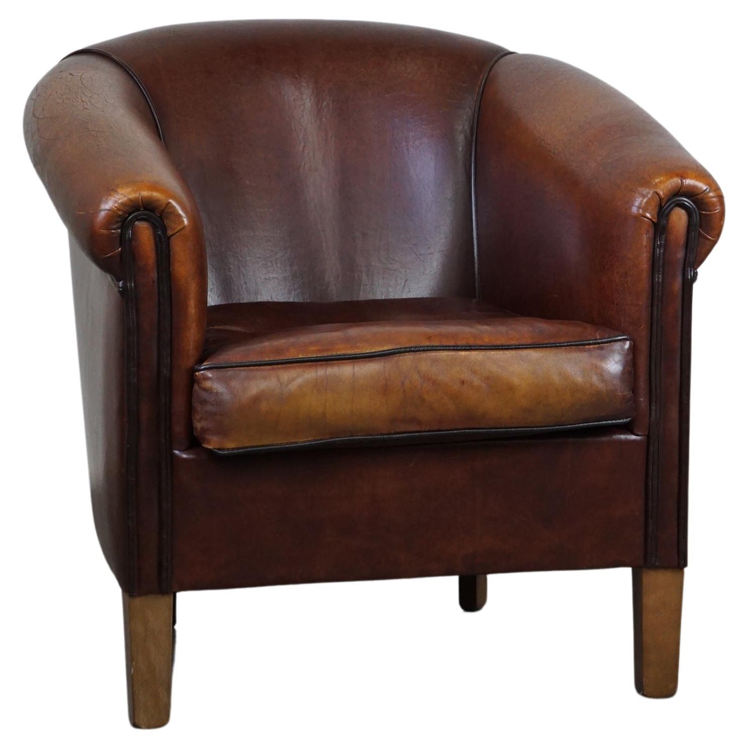 Set of 2 vintage sheep leather club chairs with a beautiful worn look ...