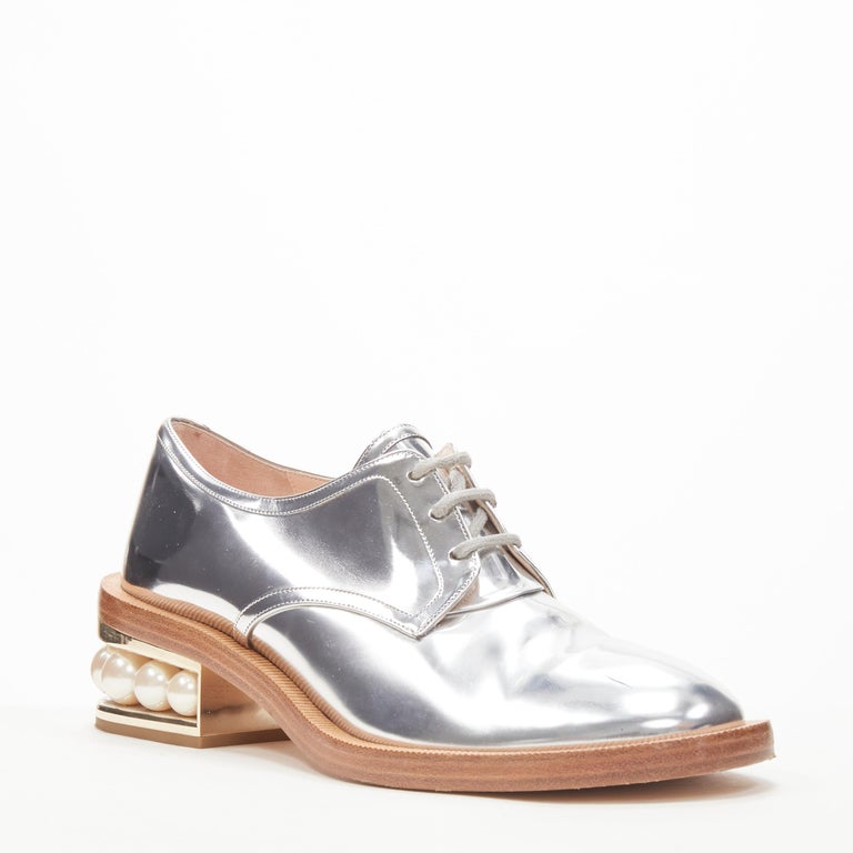 NICHOLAS KIRKWOOD metallic silver pearl embellished gold heel brogue ...