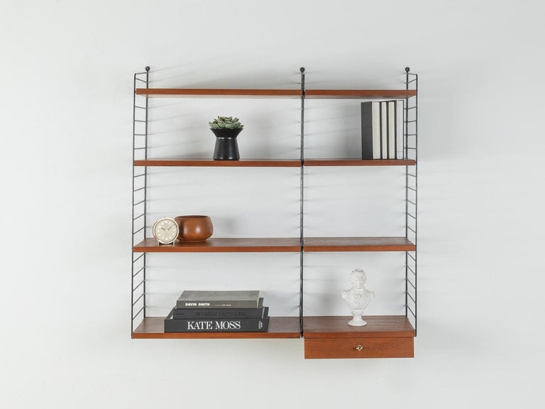 Nils Strinning Shelving System For Sale at 1stDibs