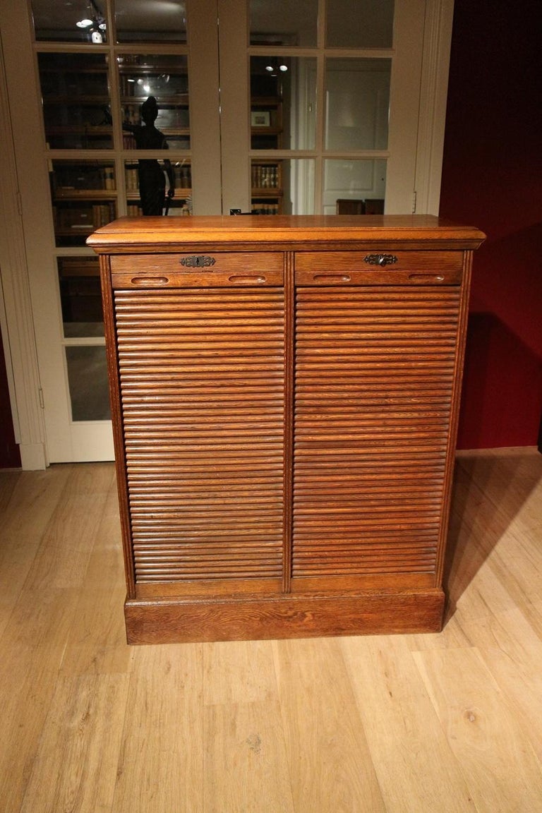 Oak Double Filing Cabinet with Shutters, 18 Drawers at 1stDibs
