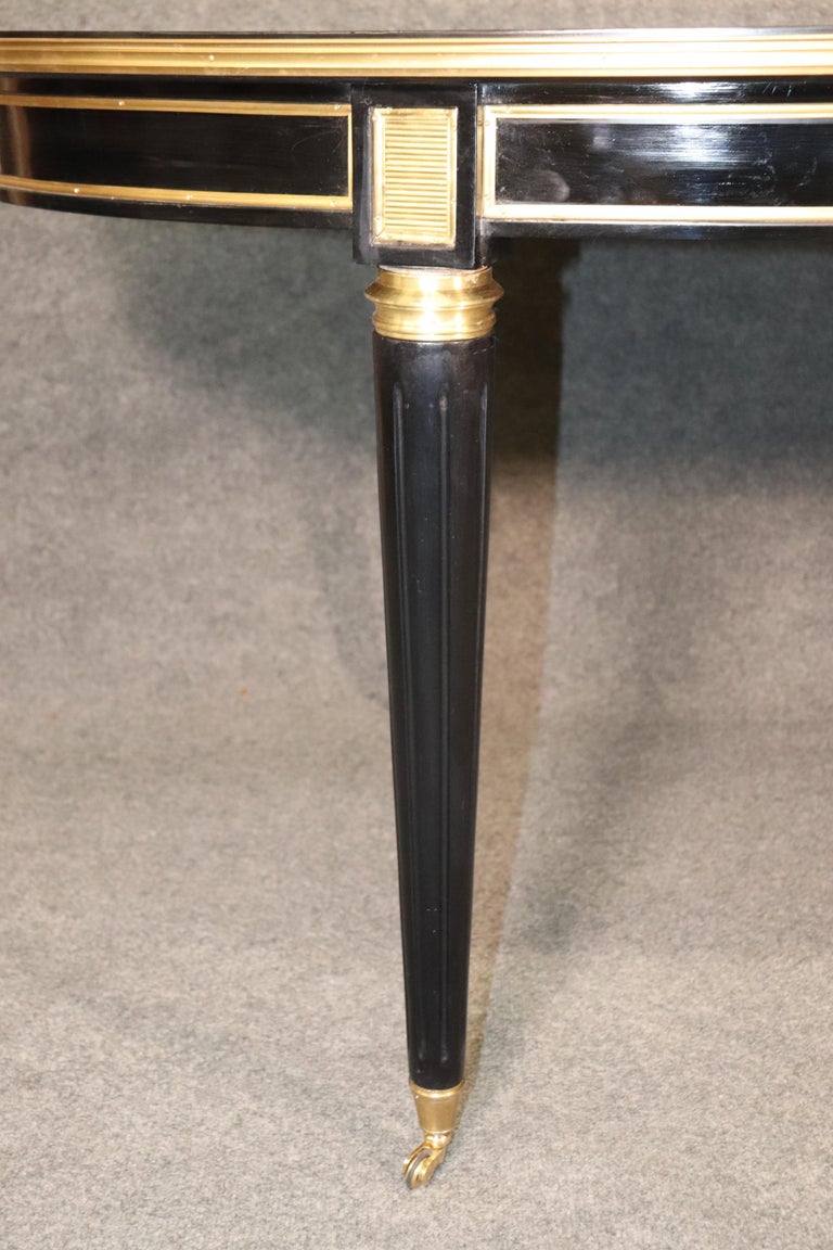 Opulent Black Lacquer and Brass Trimmed Dining Table in the manner ...