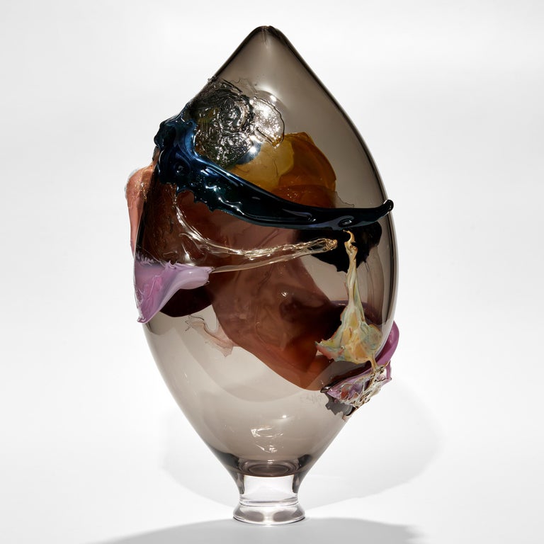 Ore II, a grey, pink, yellow, teal and dark blue glass artwork by ...