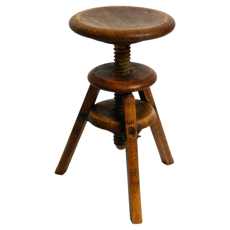 Original 30s French industrial swivel stool made of heavy oak at 1stDibs