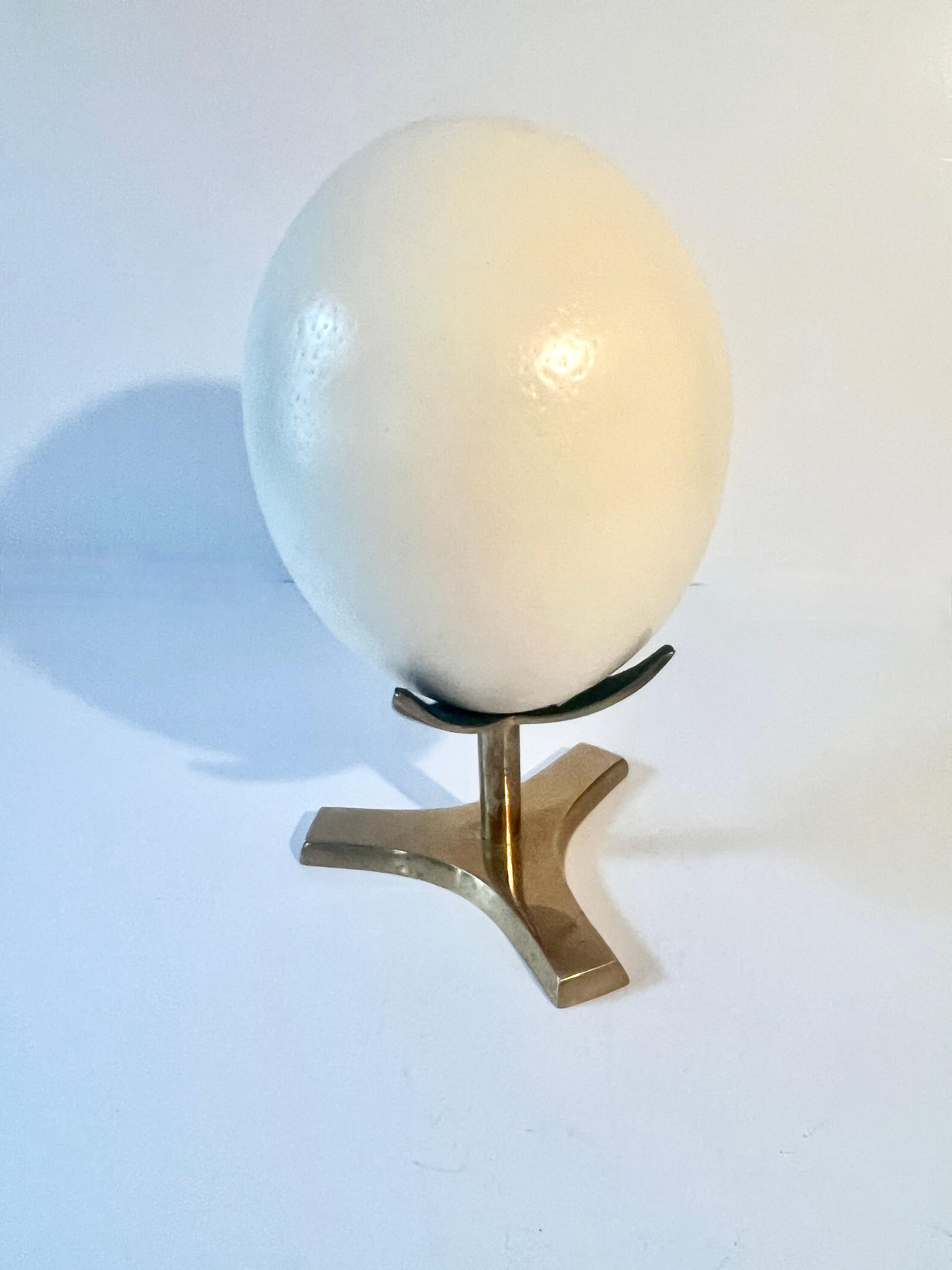 Ostrich Egg Displayed on Solid Brass Four Footed Stand at 1stDibs