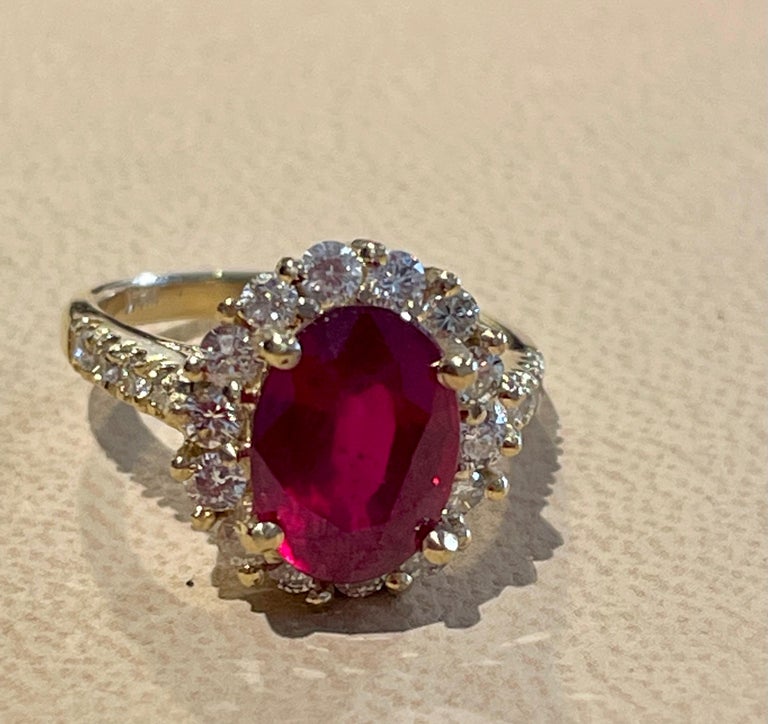 Oval 5 Carat Treated Ruby and 1.25 Carat Diamond 14 Karat Yellow Gold ...