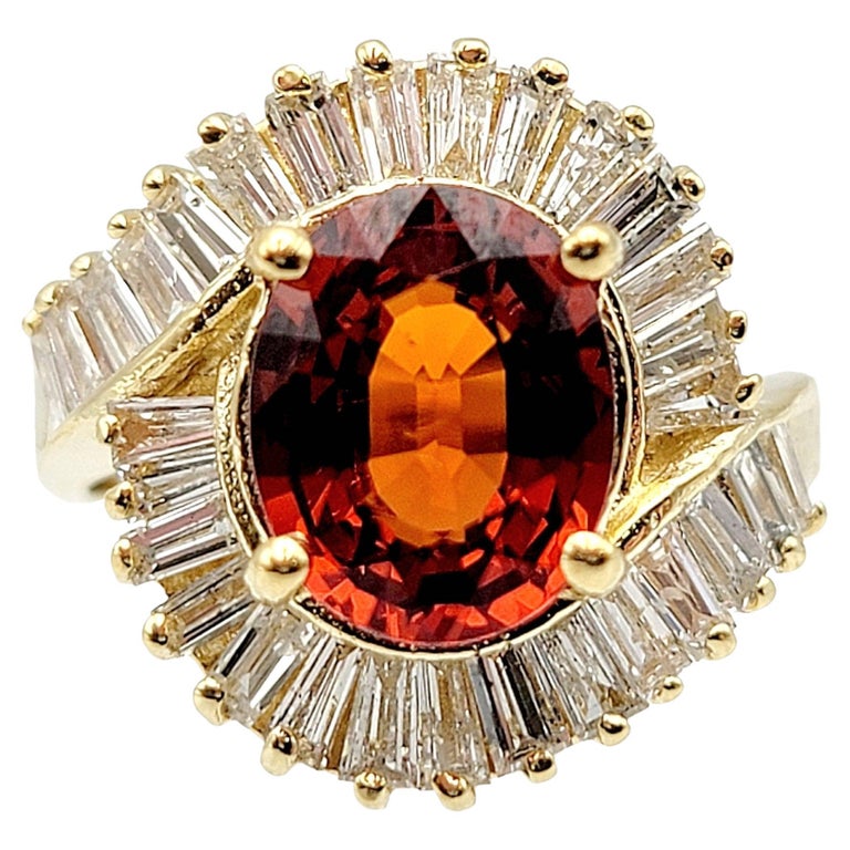 Oval Cut Garnet and Baguette Diamond Swirl Halo Cocktail Ring in 14 ...