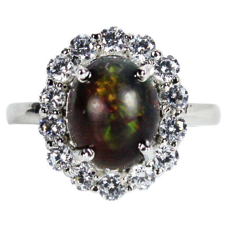 Oval Cut Natural Black Opal Ring For Sale at 1stDibs