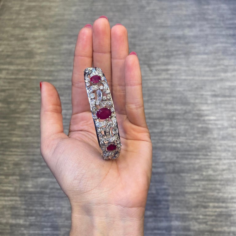 Oval Cut Ruby and Diamond Bangle Bracelet For Sale at 1stDibs