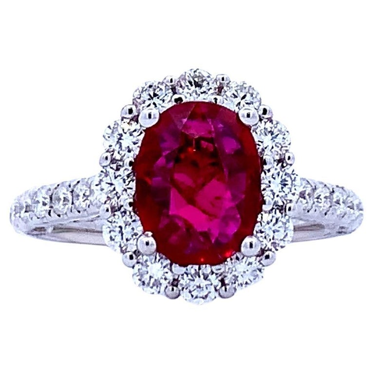Oval Cut Ruby Halo Ring For Sale at 1stDibs
