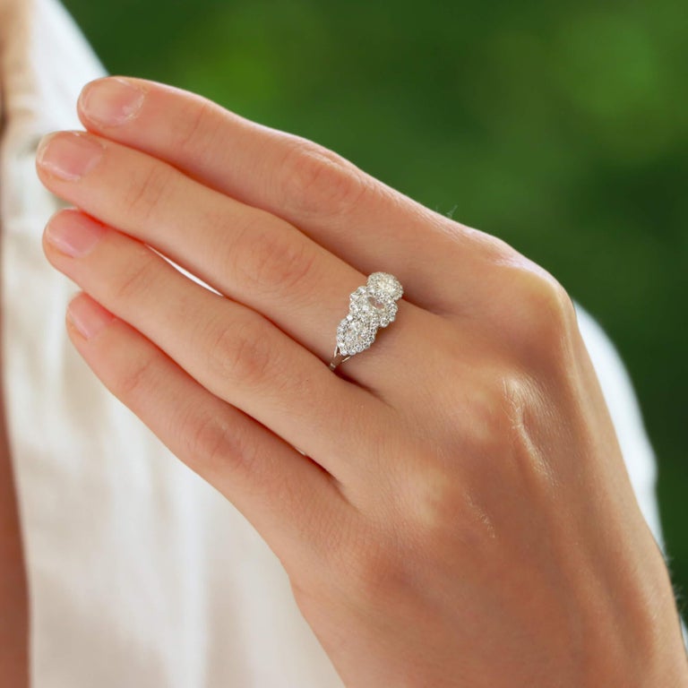 Oval Diamond Floral Cluster Three Stone Ring Set in Platinum For Sale ...