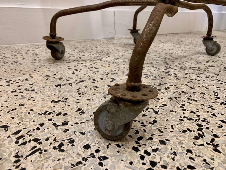 Oval Floor Mirror with Iron Branch Detail on Casters For Sale at 1stDibs