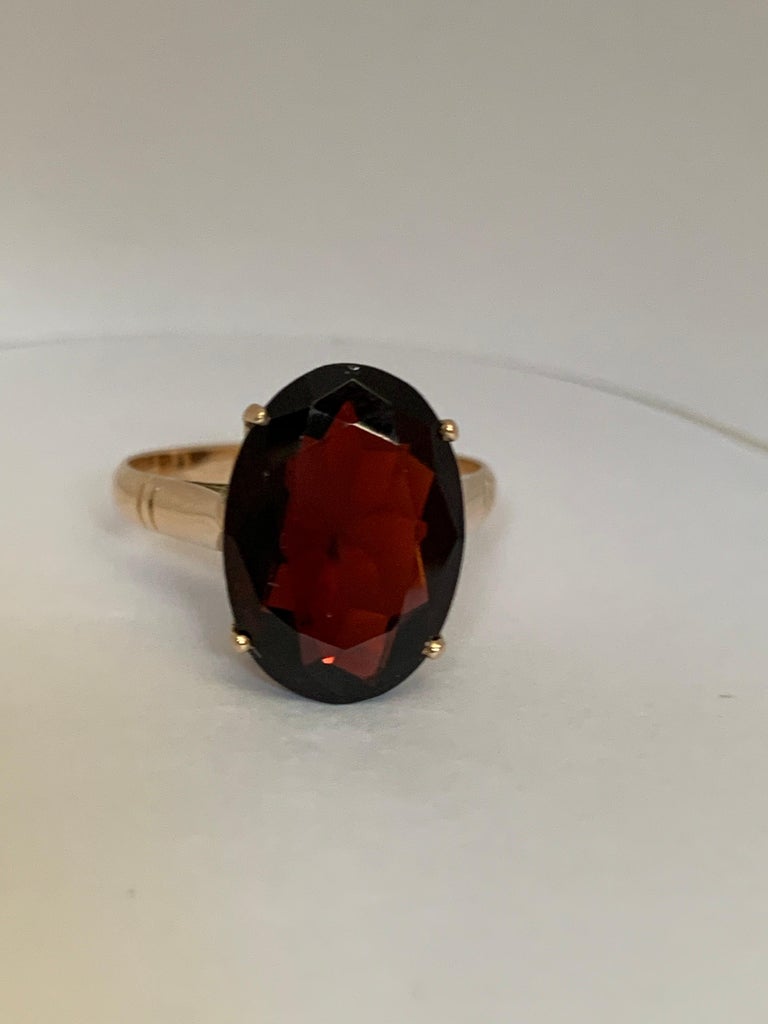 Oval Garnet Set in 14 Karat Yellow Gold Ring For Sale at 1stDibs