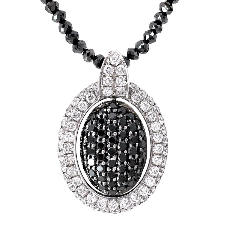 Oval Pendant with Reversible Black and White Diamond Center on Black ...