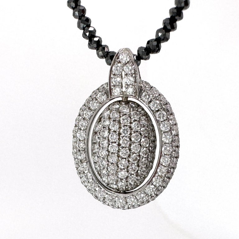 Oval Pendant with Reversible Black and White Diamond Center on Black ...