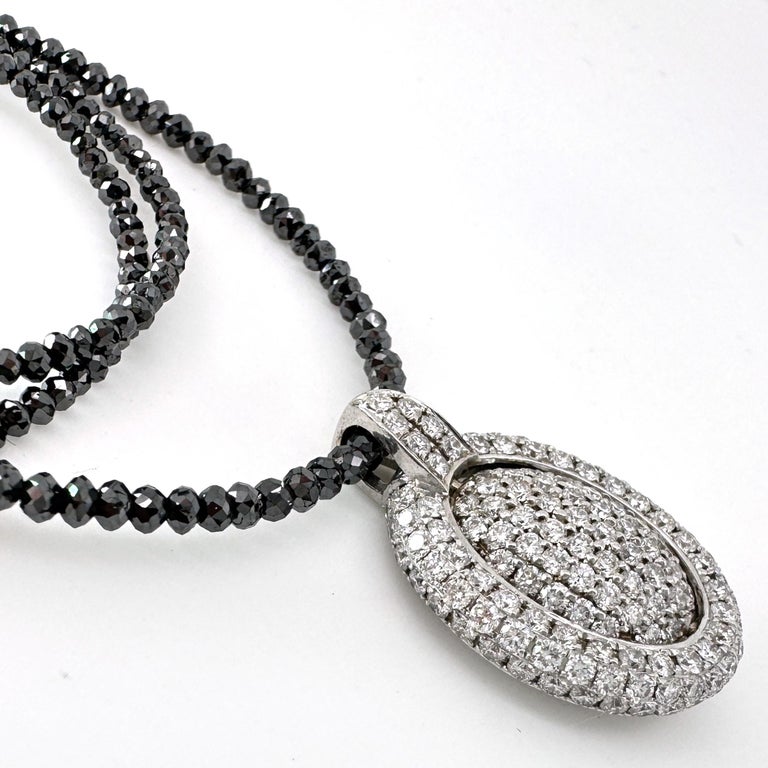 Oval Pendant with Reversible Black and White Diamond Center on Black ...