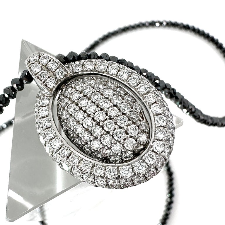 Oval Pendant with Reversible Black and White Diamond Center on Black ...