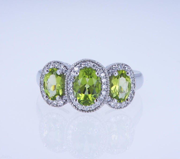 Customizable Oval Peridot and Diamond 3-Stone Ring For Sale at 1stDibs