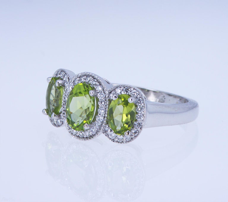 Customizable Oval Peridot and Diamond 3-Stone Ring For Sale at 1stDibs