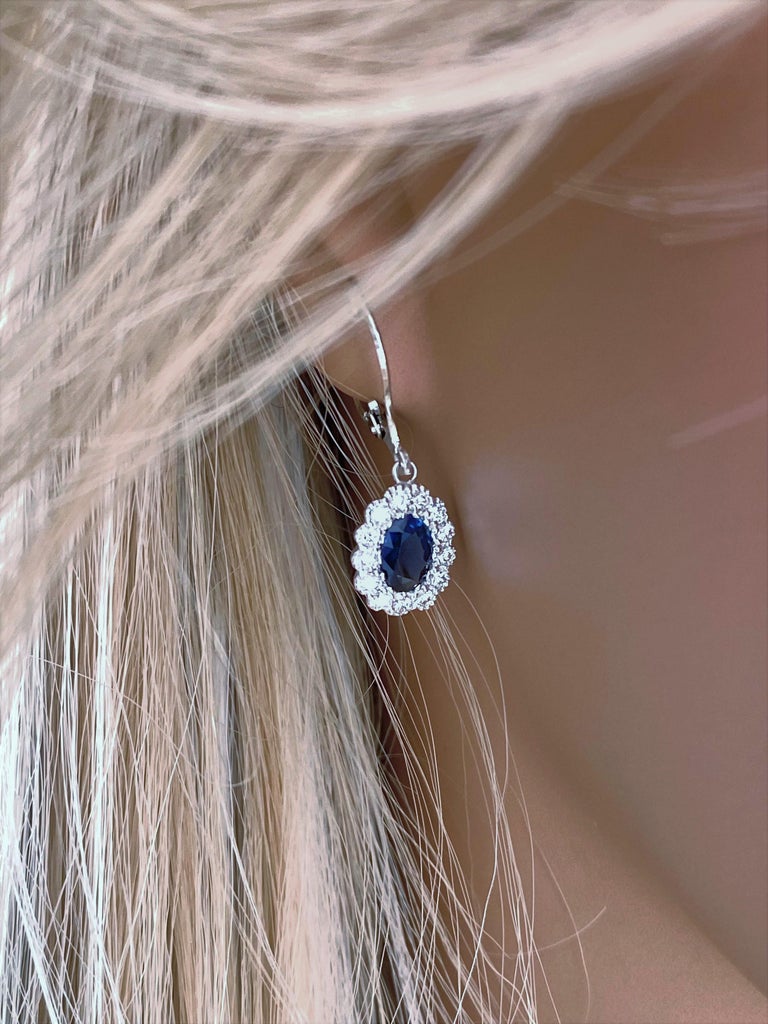 Ceylon Oval Sapphire and Diamond White Gold Cluster Lever Back Earrings at 1stDibs