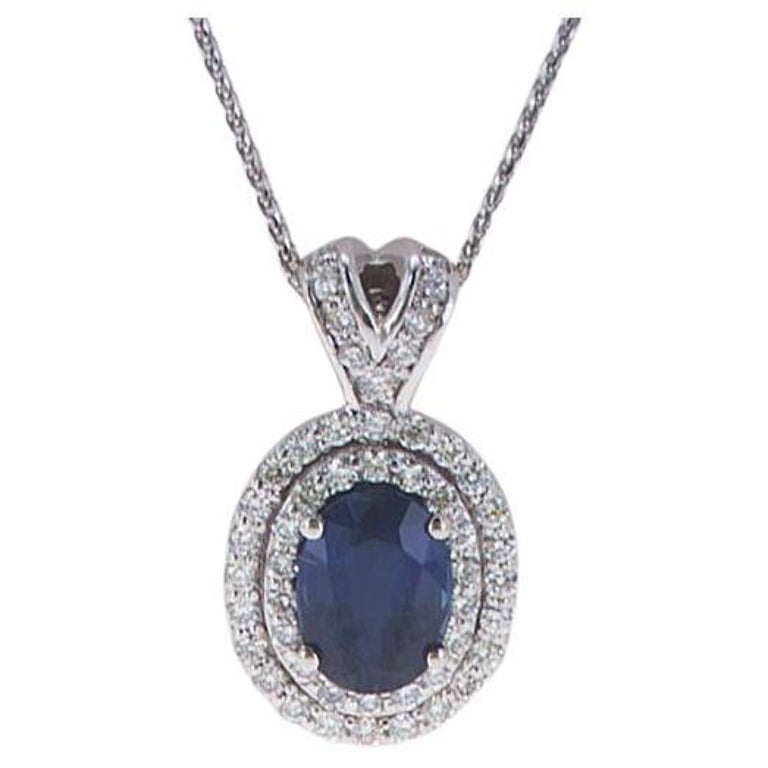 Oval Sapphire Double Halo Pendant For Sale at 1stDibs