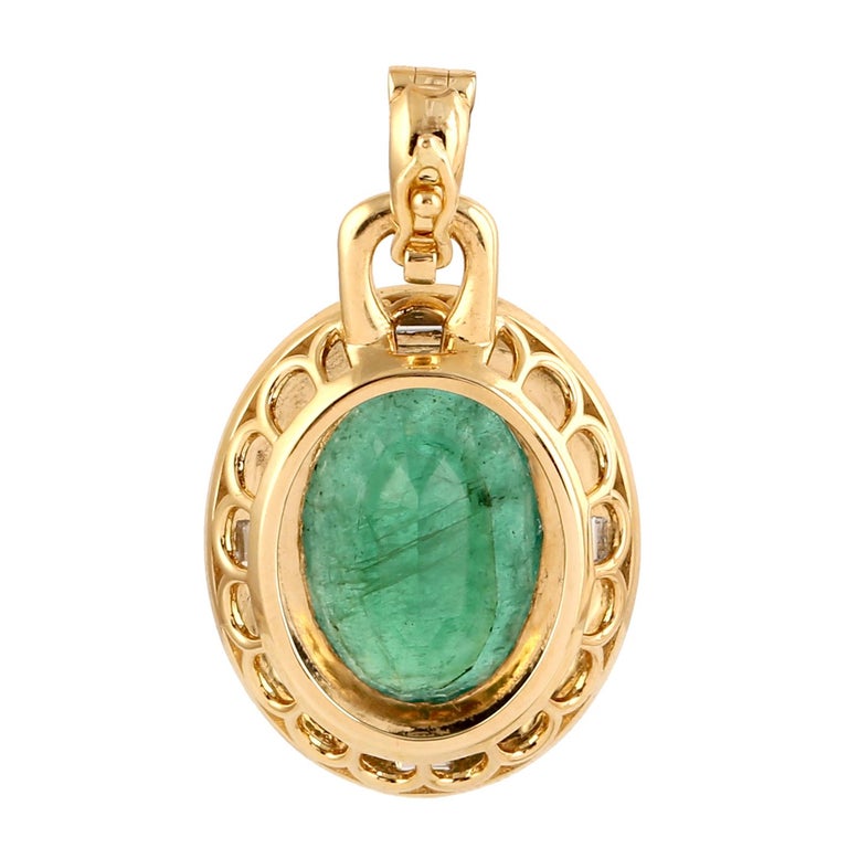 Oval Shaped Emerald Pendant With Diamonds Enclosed In 18k Yellow Gold ...