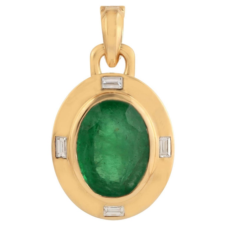 Oval Shaped Emerald Pendant With Diamonds Enclosed In 18k Yellow Gold ...