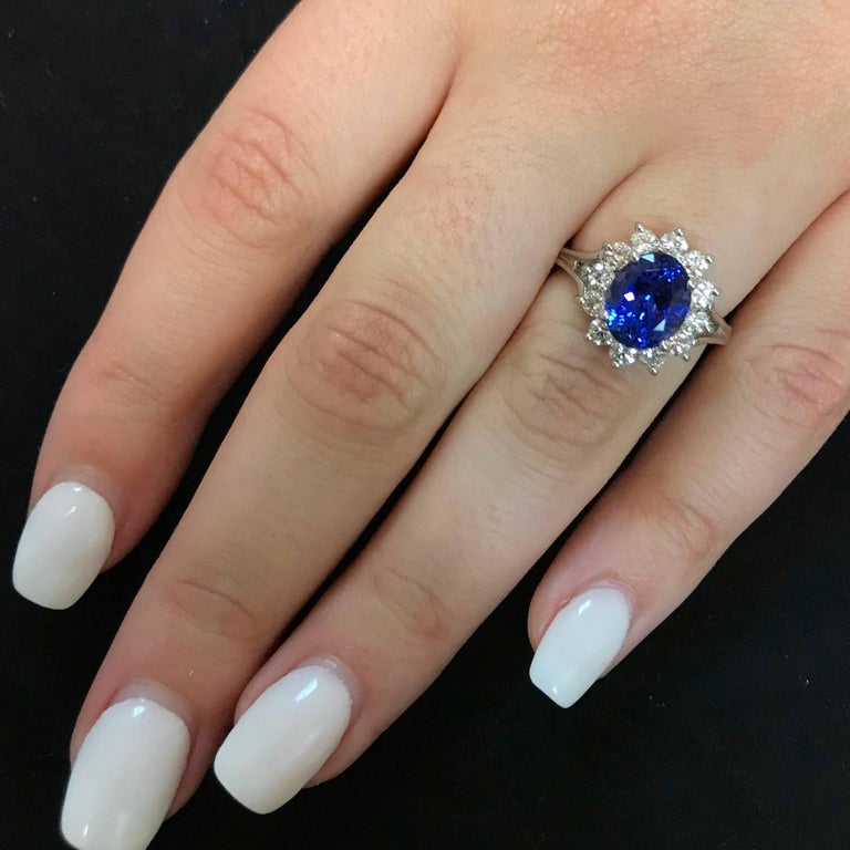 Oval Natural Tanzanite White Diamond Flower Halo Engagement Ring 14k