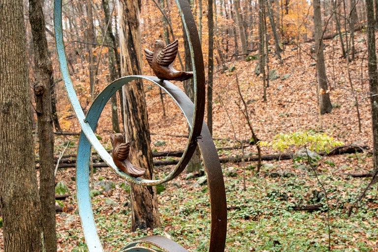 Painted Iron Garden Sculpture with Log Storage Base For Sale at 1stDibs