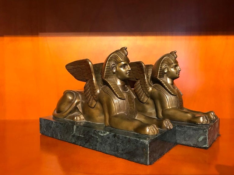 Pair of 19th Century Bronze Winged Sphinx on Marble Bases at 1stDibs