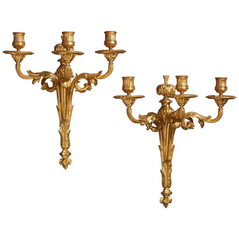 Pair of 18th Century French Ormolu Three-Branch Wall Sconces at 1stDibs