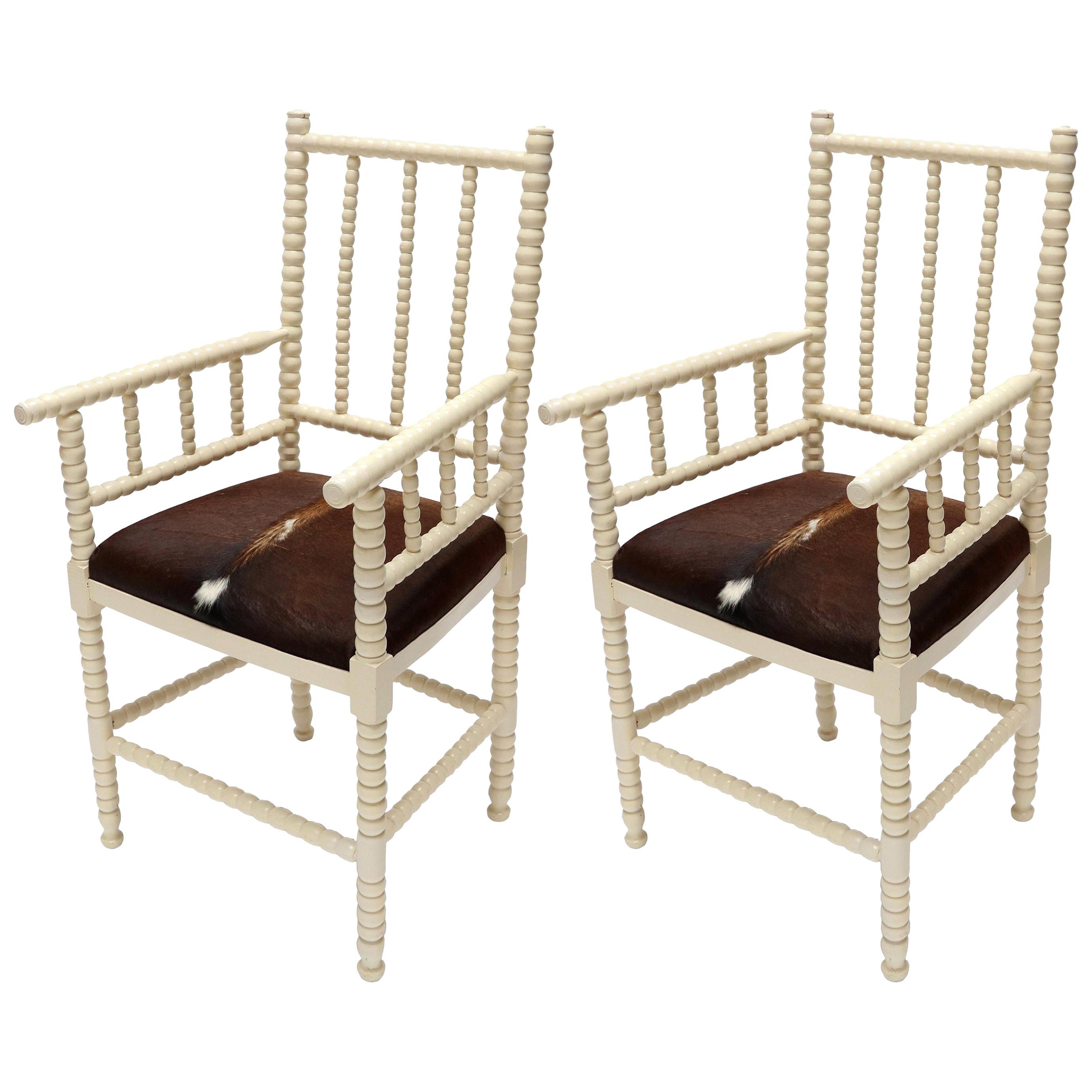 Pair of 1940s Ivory Spool Armchairs in Brown Cow Hide For Sale at 1stDibs