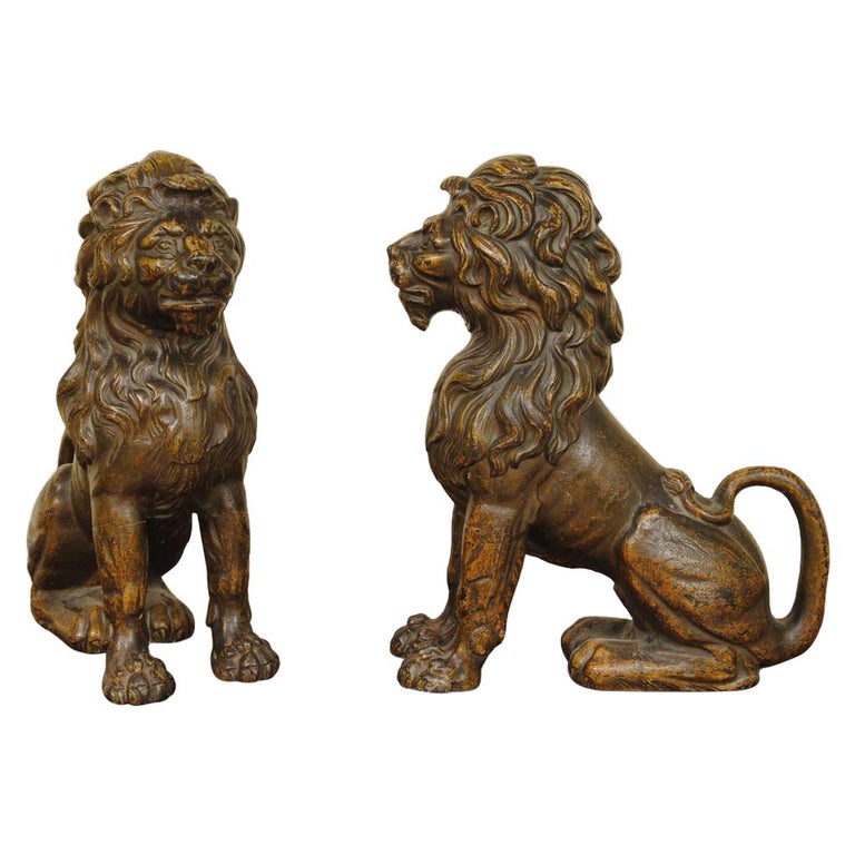 Pair of 19th Century Patinated Cast Iron Lions at 1stDibs