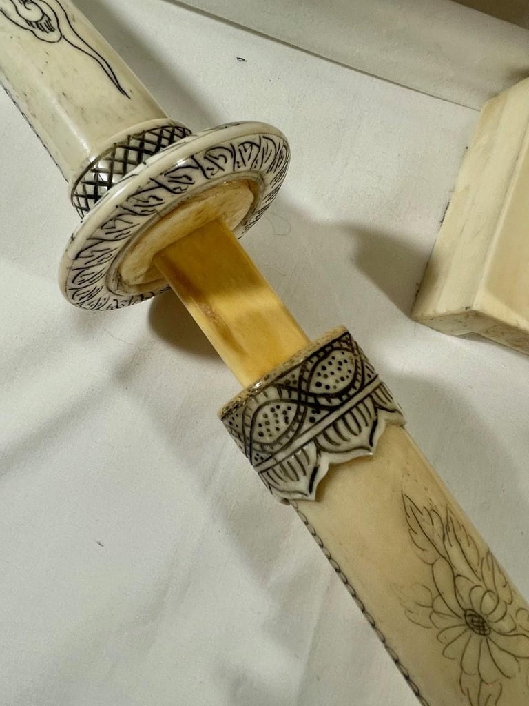Pair of 20th Century Chinese Incised Bone Samurai Style Swords For Sale at 1stDibs
