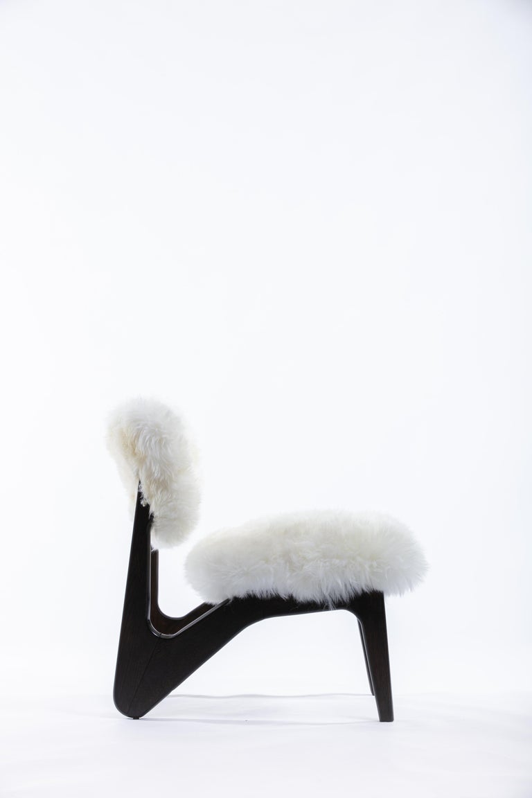 Pair of Ivory Sheepskin and Sculpted Walnut Slipper Chairs at 1stDibs