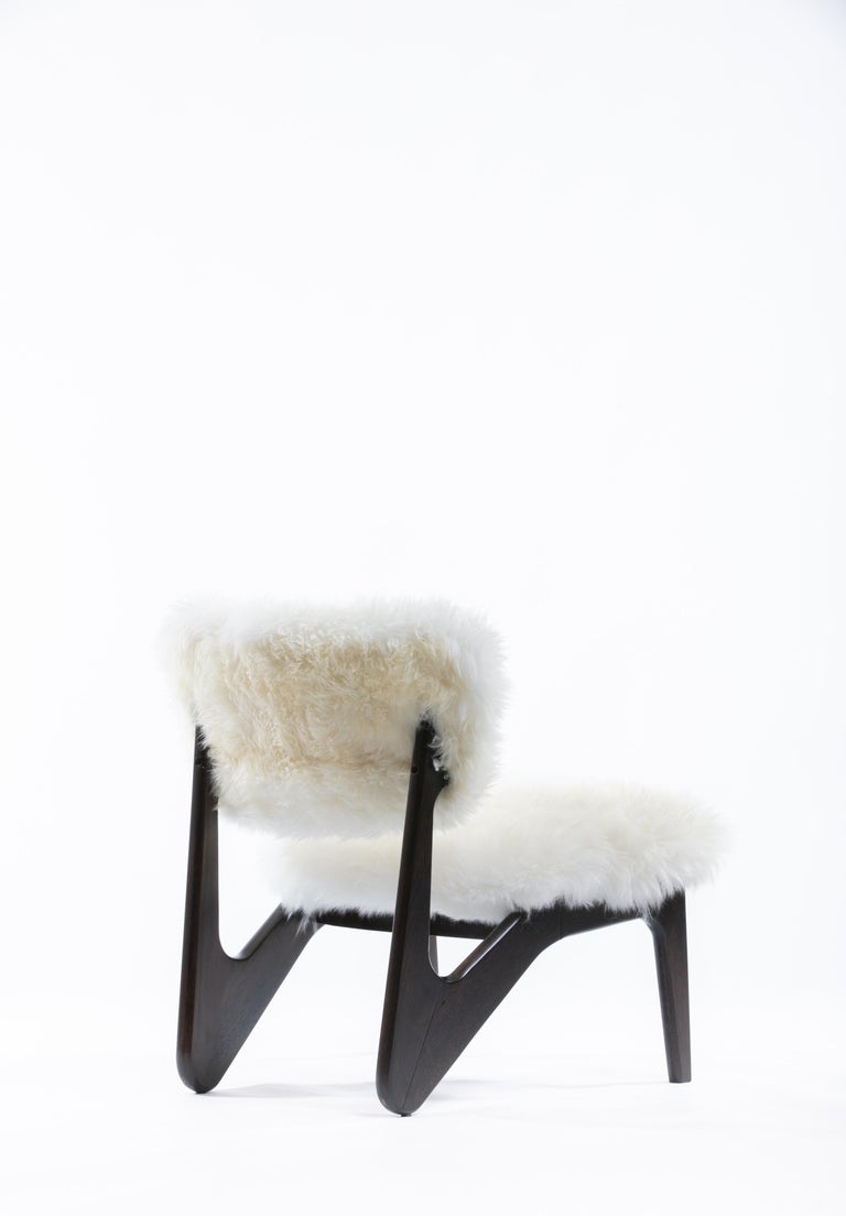 Pair of Ivory Sheepskin and Sculpted Walnut Slipper Chairs at 1stDibs