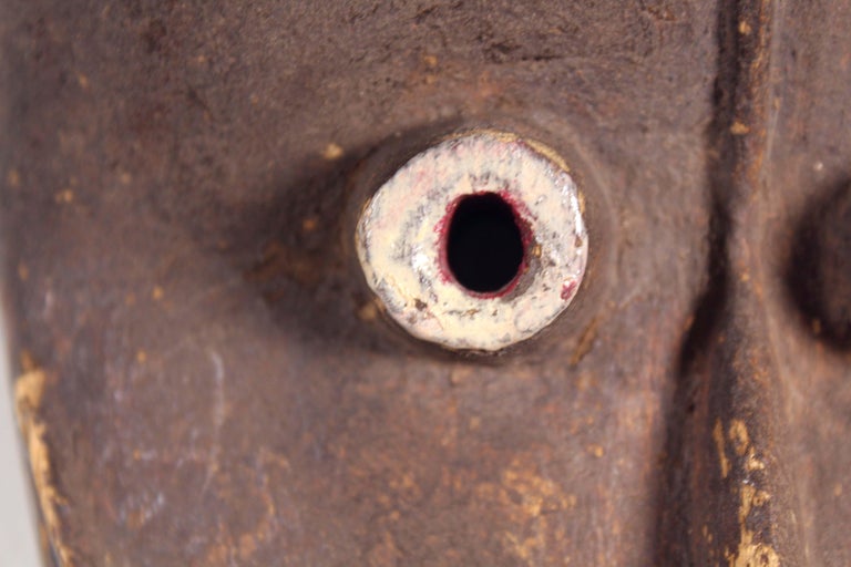 Pair of African Painted Wood Tribal Mask For Sale at 1stDibs
