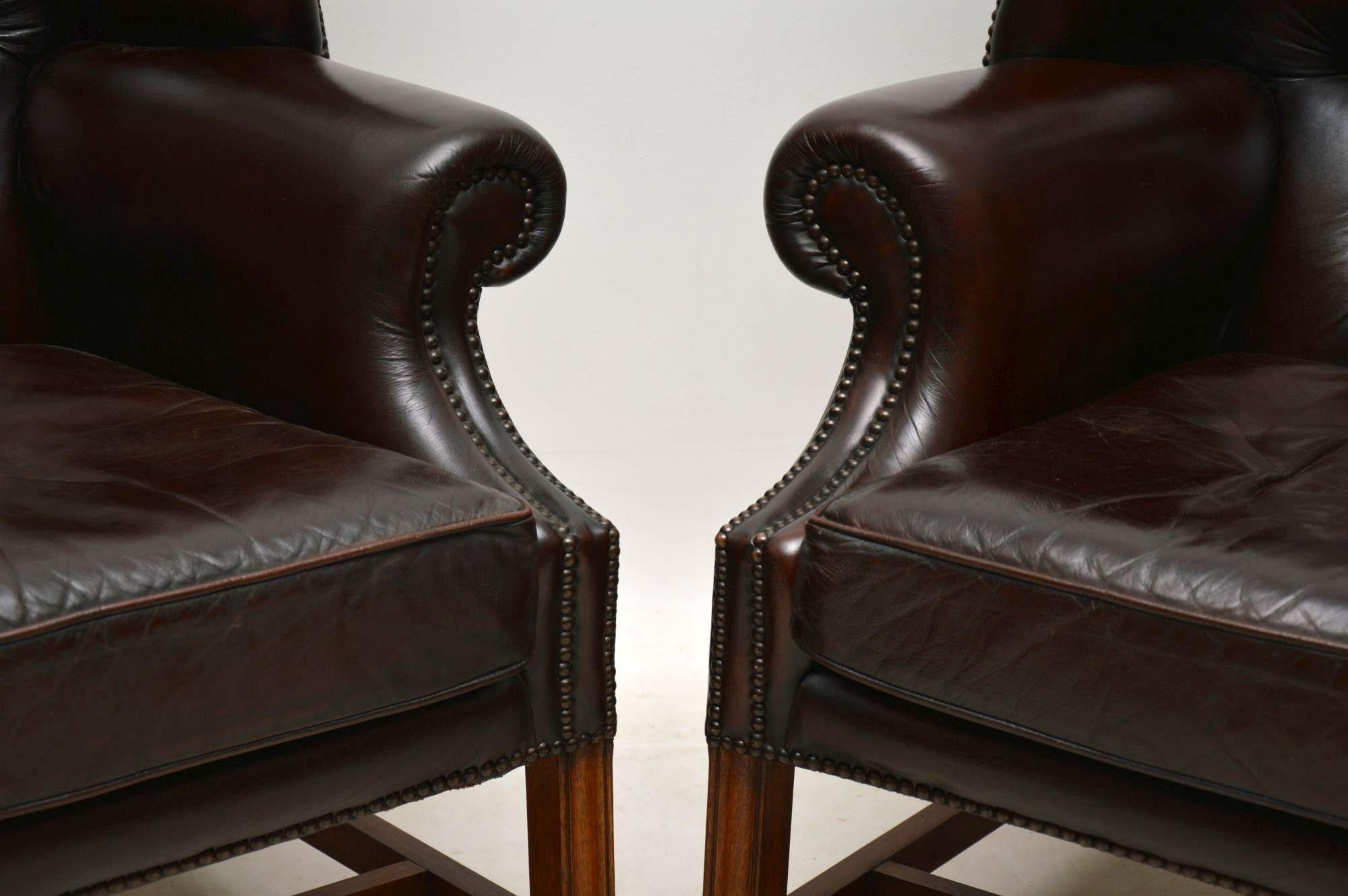 Pair of Antique Leather Wing Back Armchairs at 1stDibs