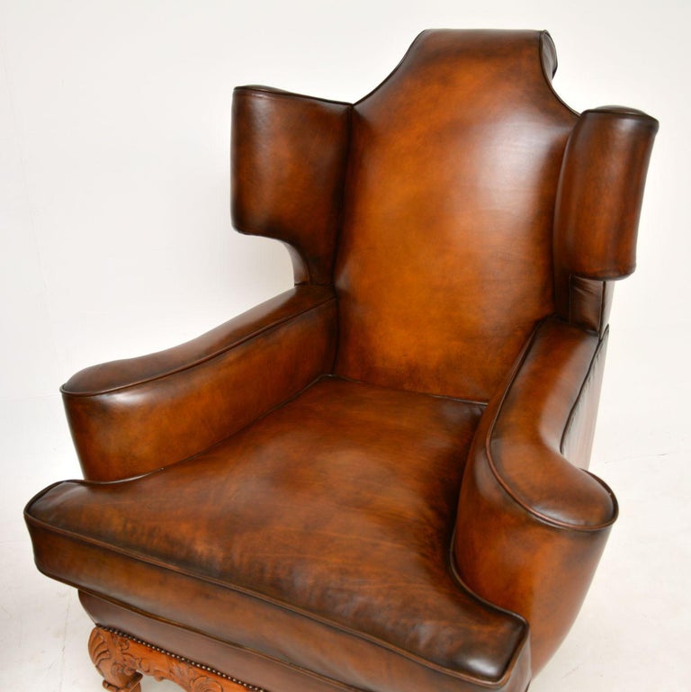 Pair of Antique Leather Wing Back Armchairs For Sale at 1stDibs