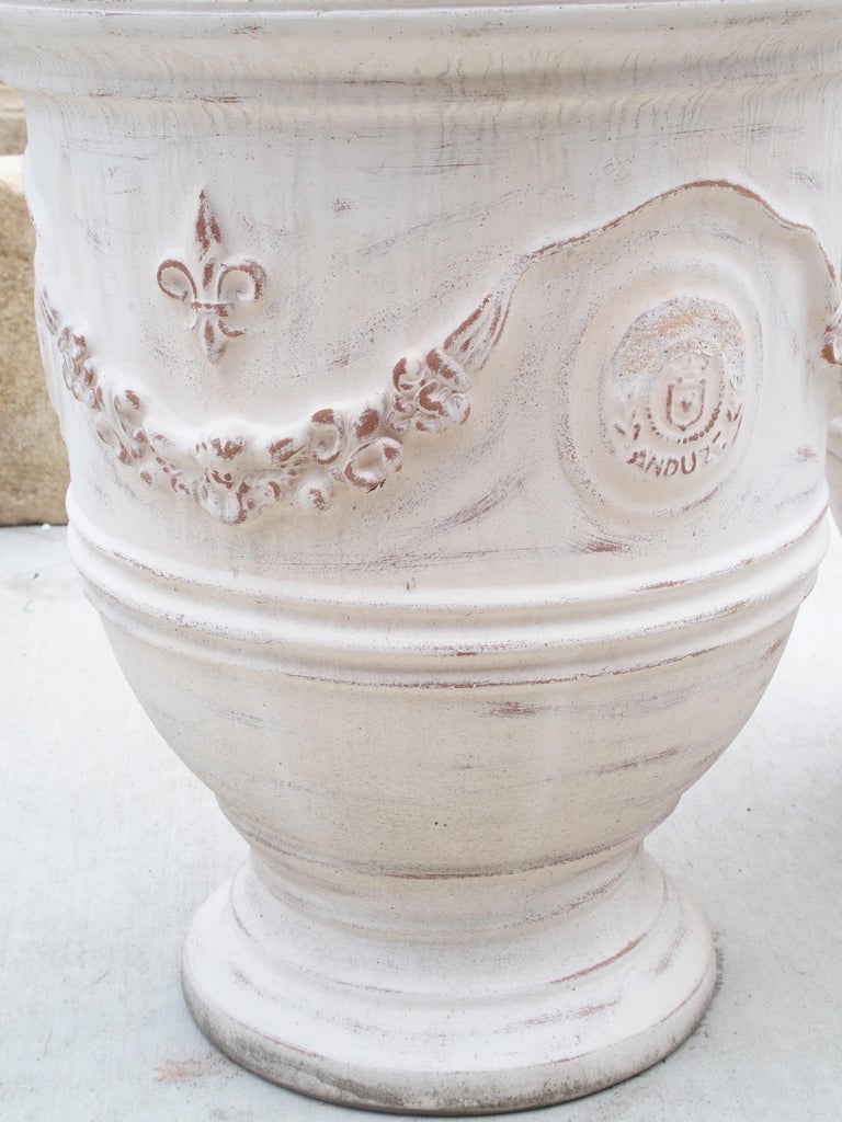 Pair of Antiqued White Fleur-de-Lys Anduze Pots from France at 1stDibs
