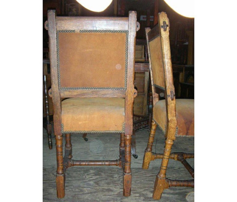 John Pollard Seddon A pair of Gothic Revival oak dining chairs. 4 more ...