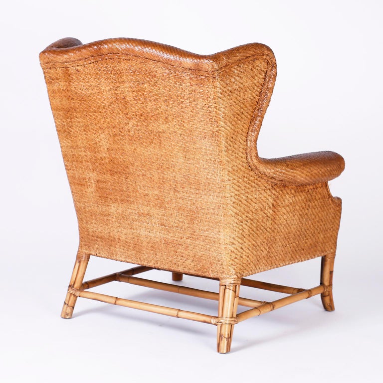 Pair of British Colonial Wicker and Bamboo Wing Chairs by Baker at 1stDibs
