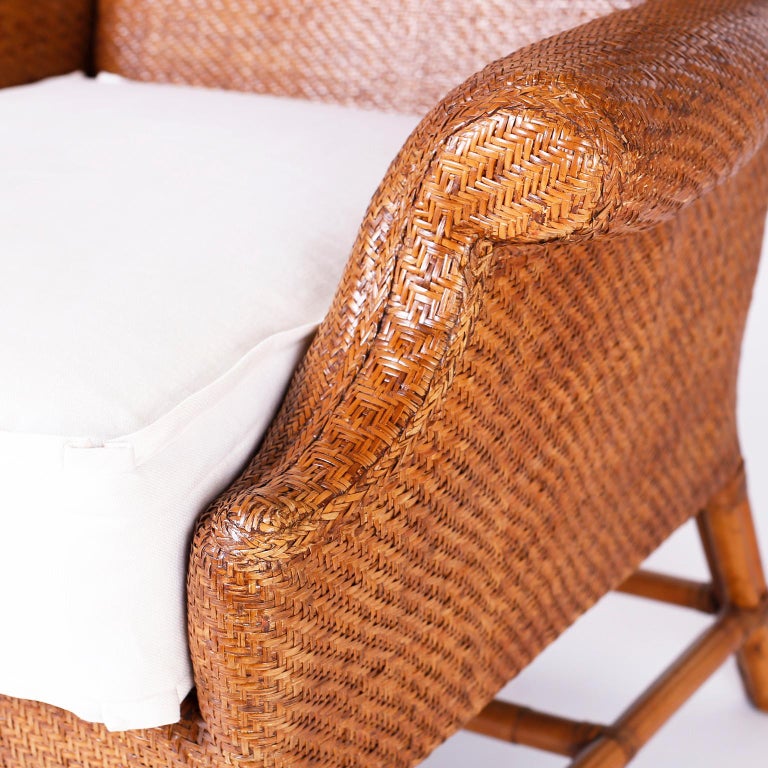 Pair of British Colonial Wicker and Bamboo Wing Chairs by Baker at 1stDibs