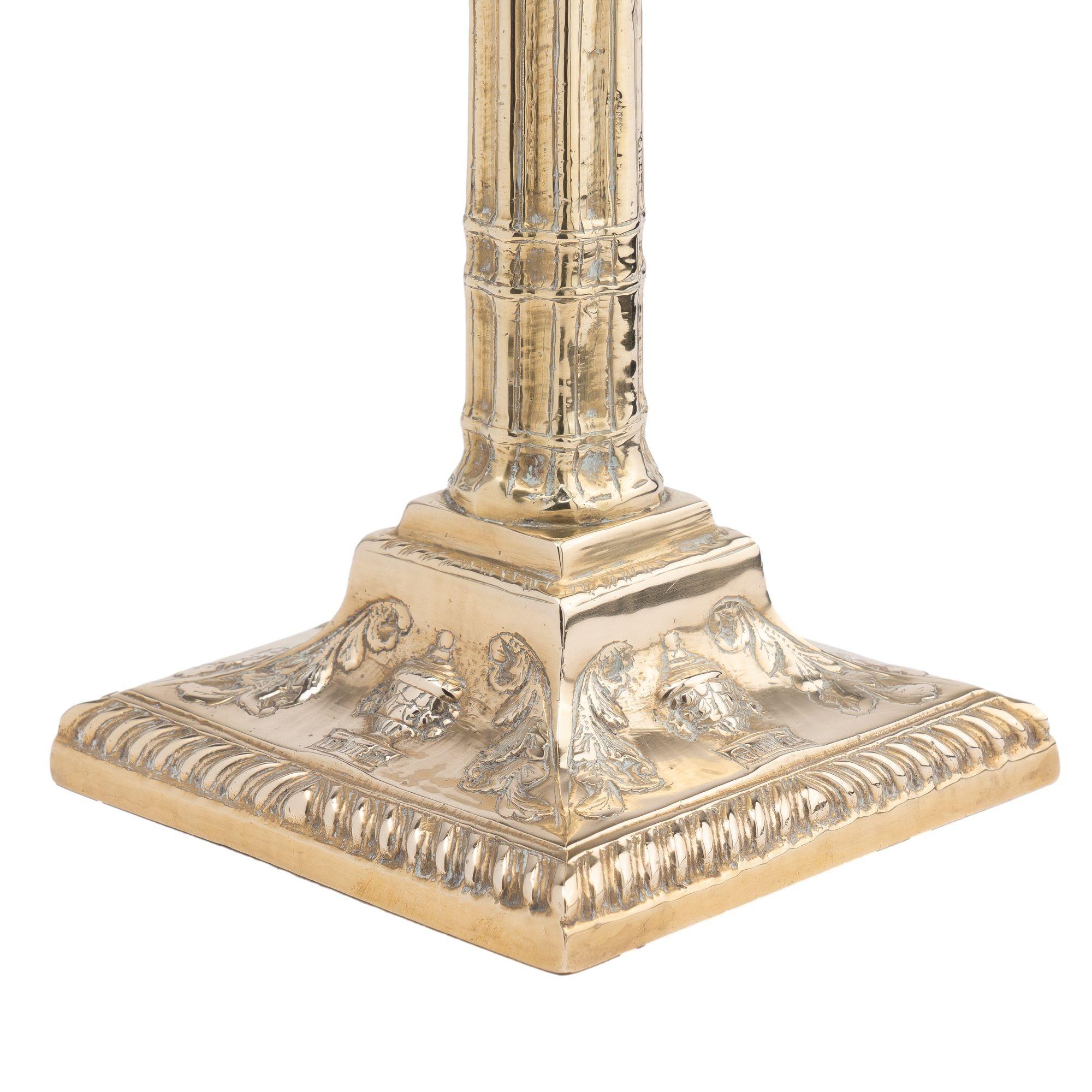 Pair of cast cluster column candlesticks by Martin, Hall and Co Ltd ...